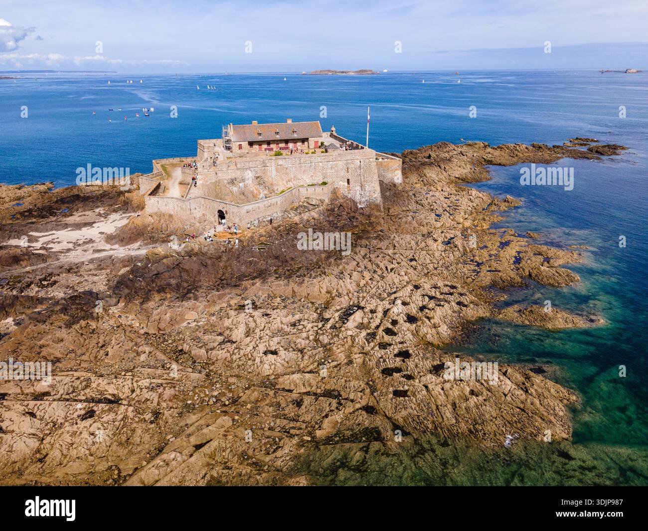 Aerial view of Fort National at low tide, showing its stone walls ...