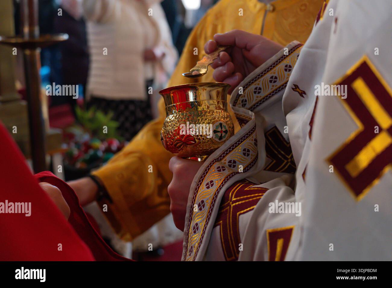 Eastern Orthodox Christian Holy Communion ceremony inside a church ...