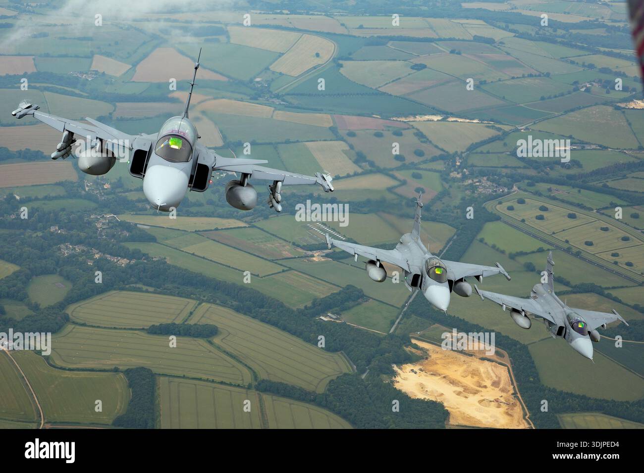 Three Swedish Air Force Saab JAS 39C Gripen multirole fighter aircraft ...