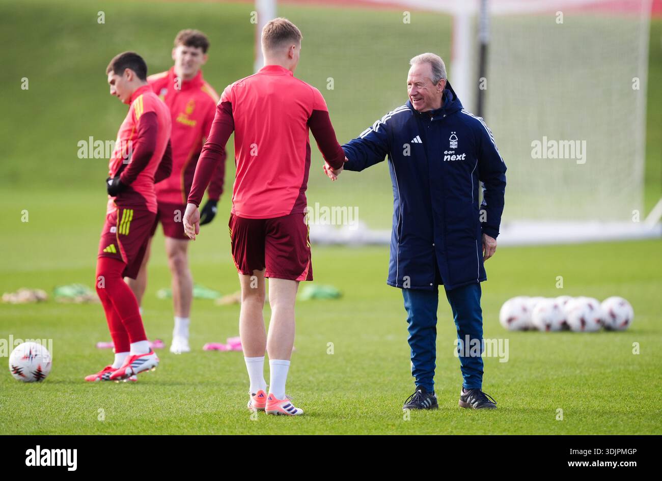 Nottingham Forest's Zach Abbott with club legend John McGovern during a ...