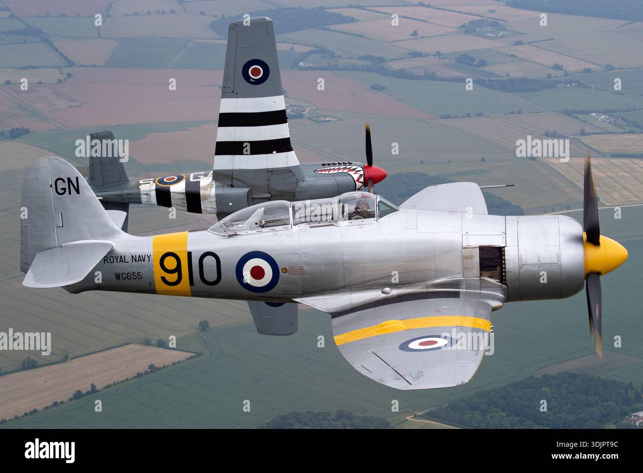 In this formation air-to-air image at UK Warbirds 2019 a Hawker Sea ...
