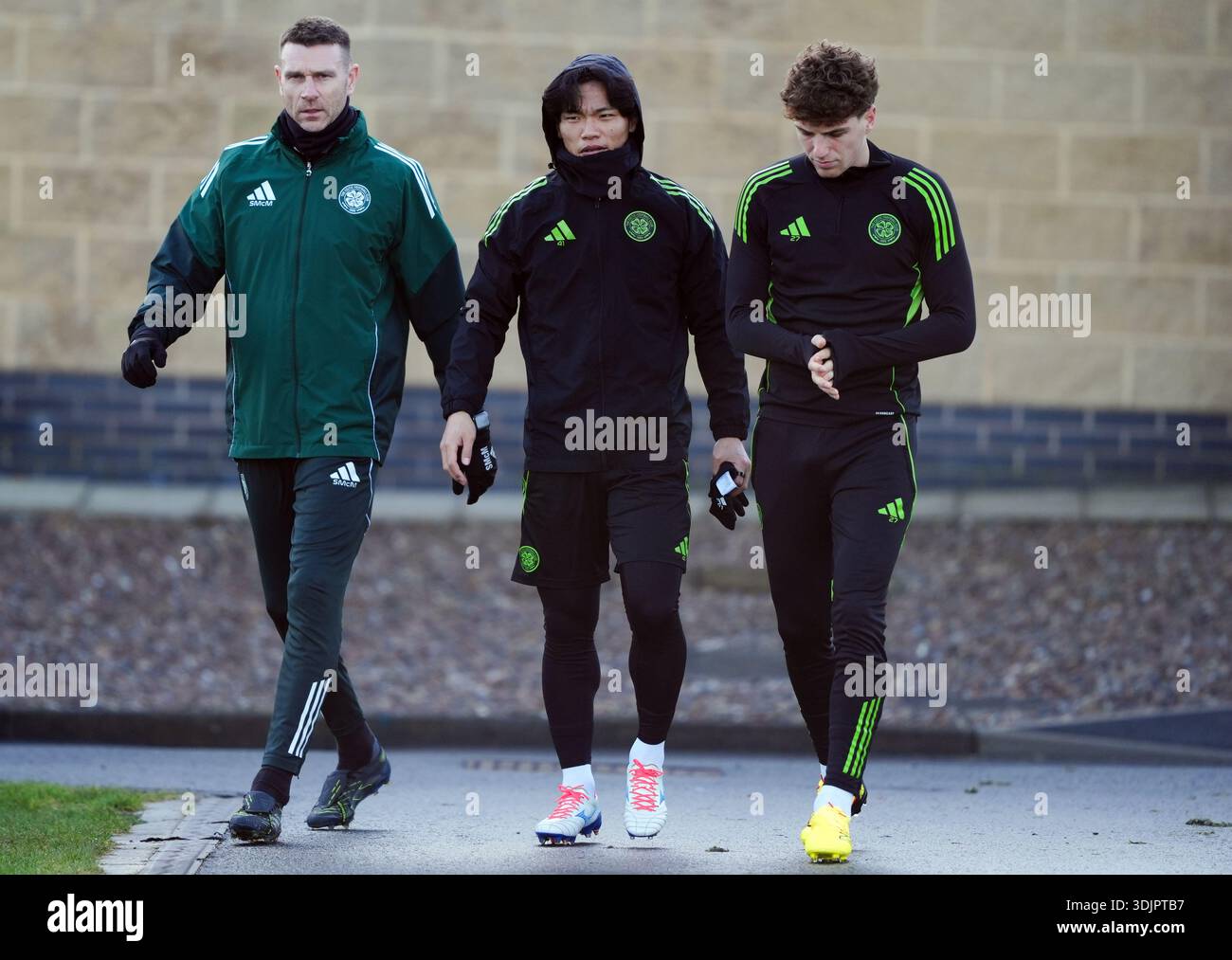 Celtic's Reo Hatate (centre) and Arne Engels (right) during a training ...