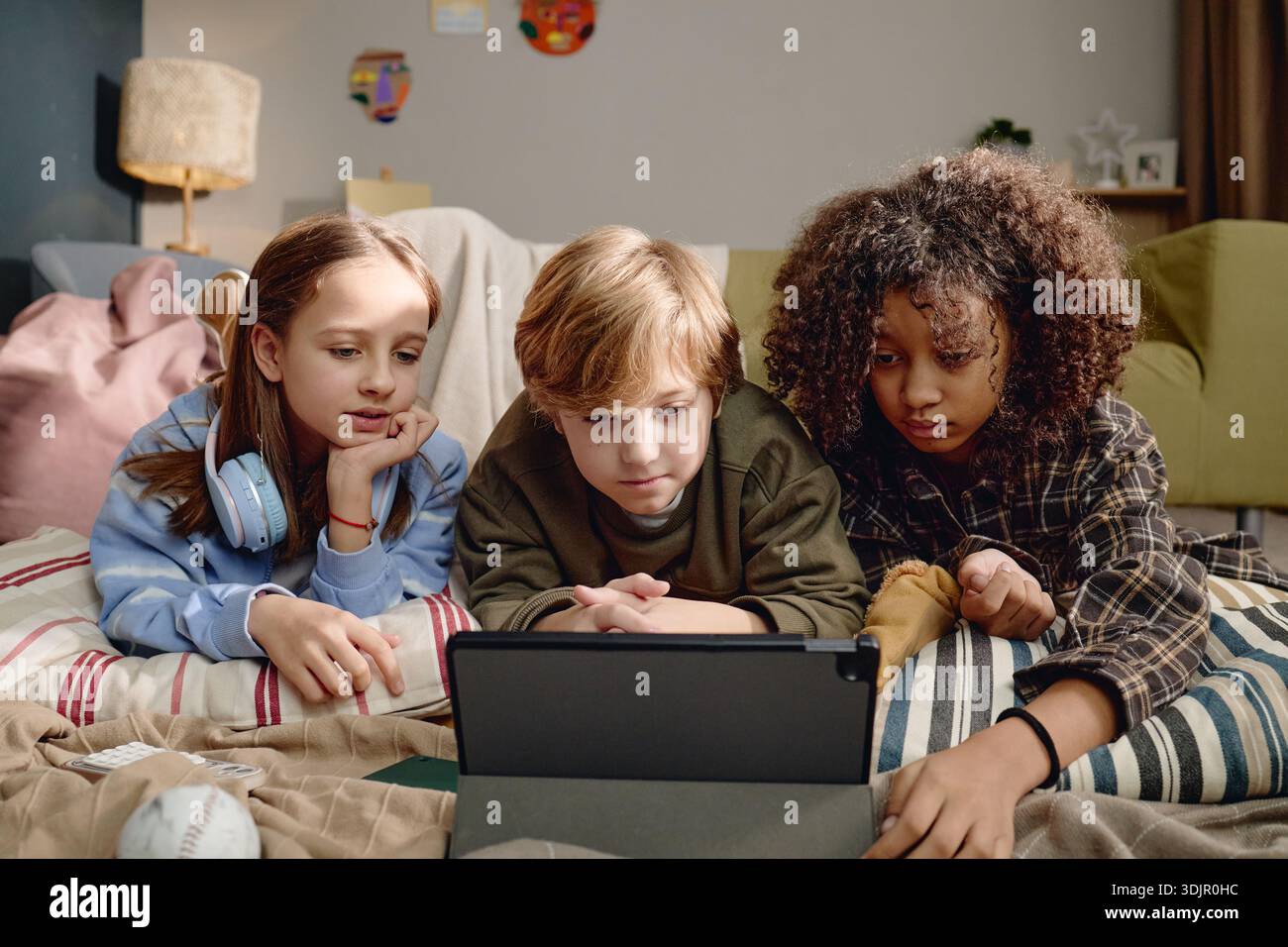 Generation Alpha Children Watching Digital Tablet Together Indoors on ...