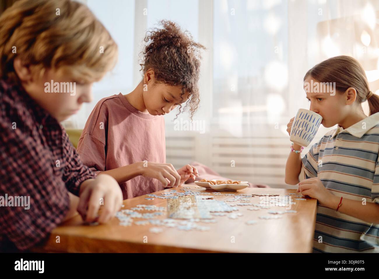 Teenager child jigsaw hi-res stock photography and images - Alamy