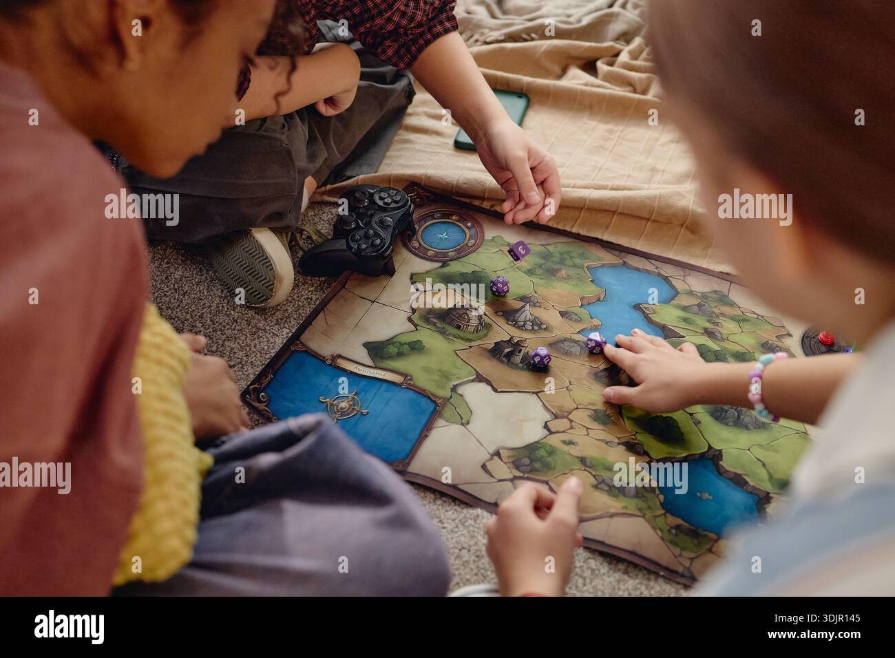 Generation Alpha Teenagers Playing Board Game Stock Photo - Alamy
