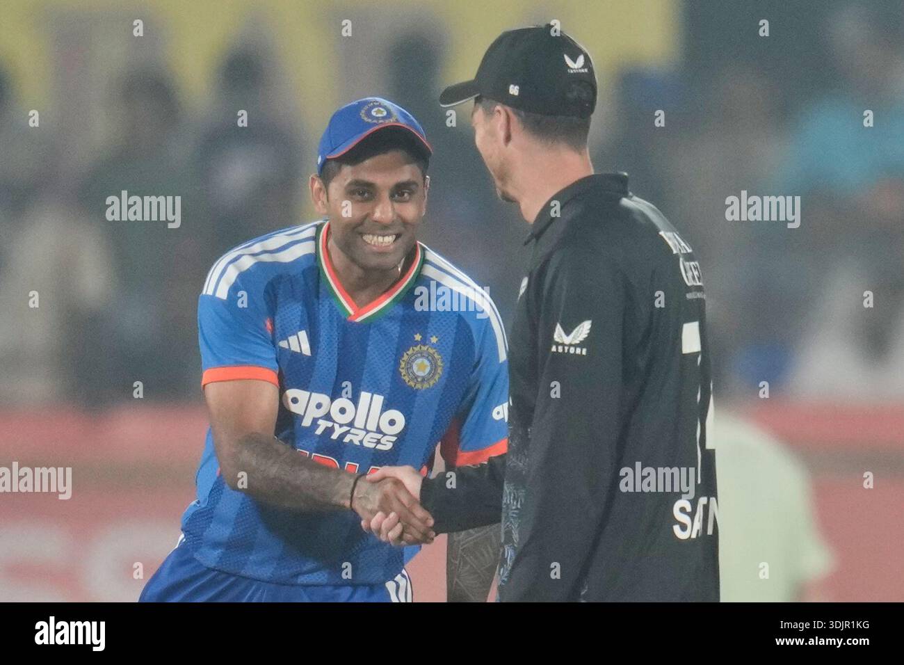 India's captain Suryakumar Yadav, left, shakes hand with New Zealand's ...