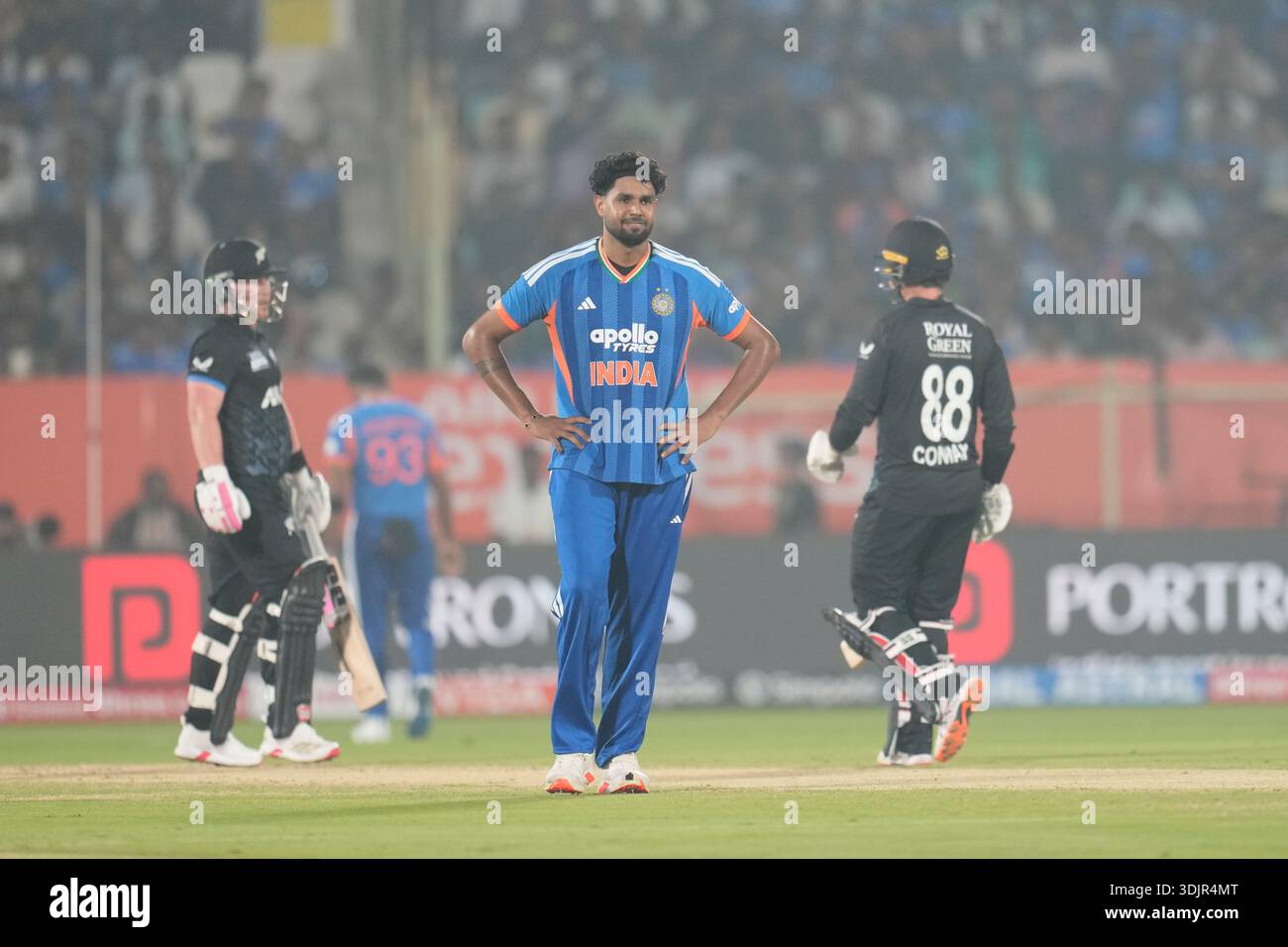 India's Harshit Rana reacts after a boundary by New Zealand's Tim ...