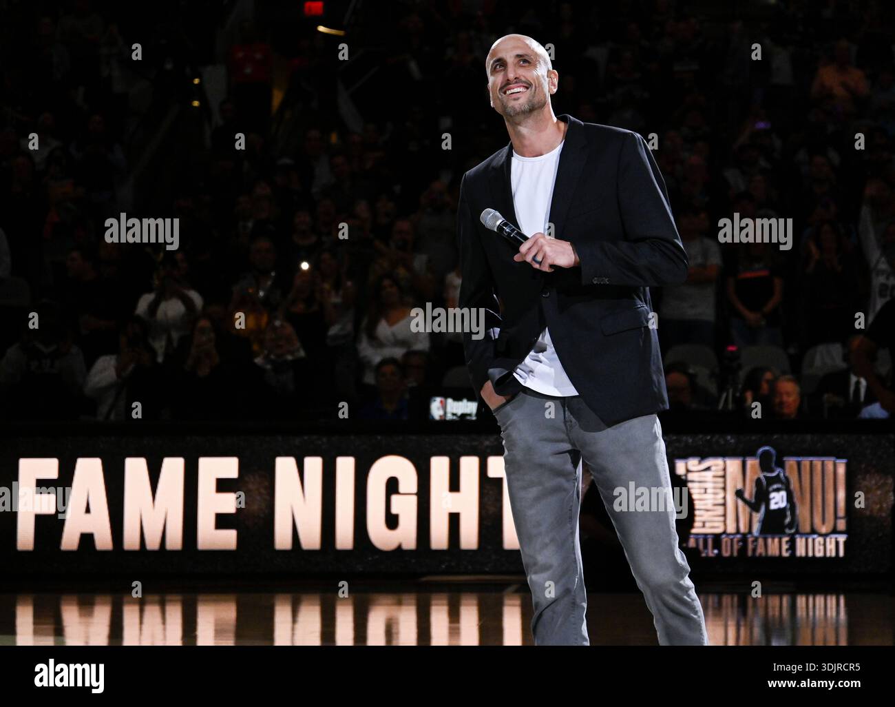 FILE - Manu Ginobili addresses fans during halftime of the Spurs' NBA ...
