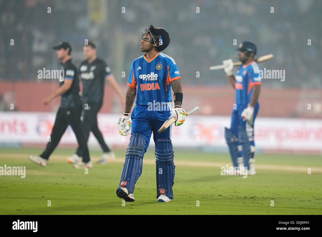 India's captain Suryakumar Yadav walks off the field after losing his ...