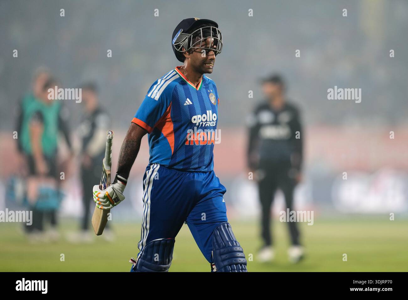 India's captain Suryakumar Yadav walks off the field after losing his ...
