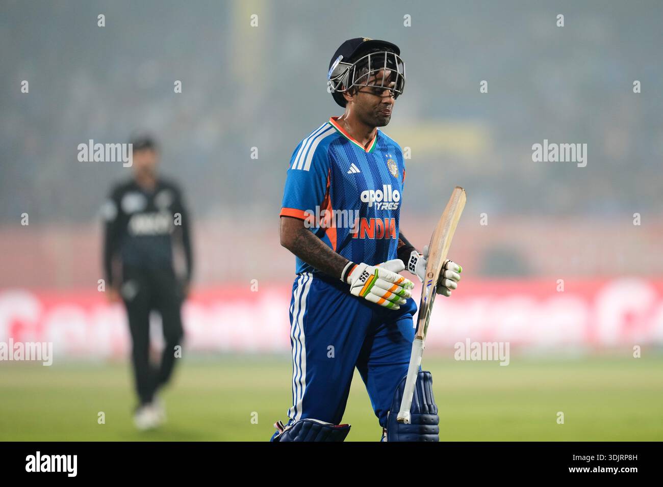 India's captain Suryakumar Yadav walks off the field after losing his ...