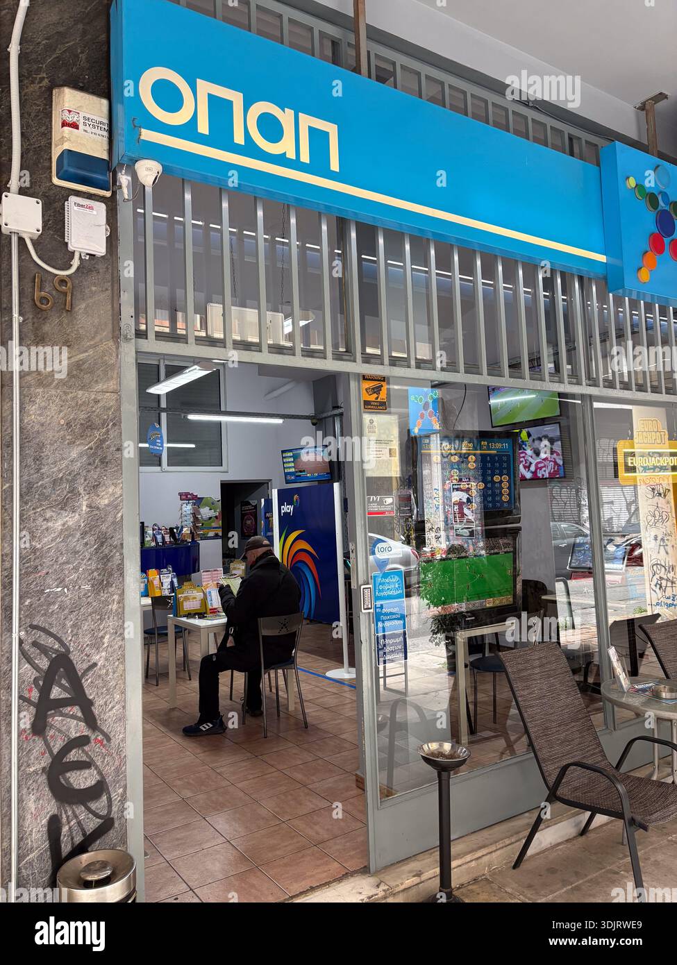 Opap betting shop hi-res stock photography and images - Alamy