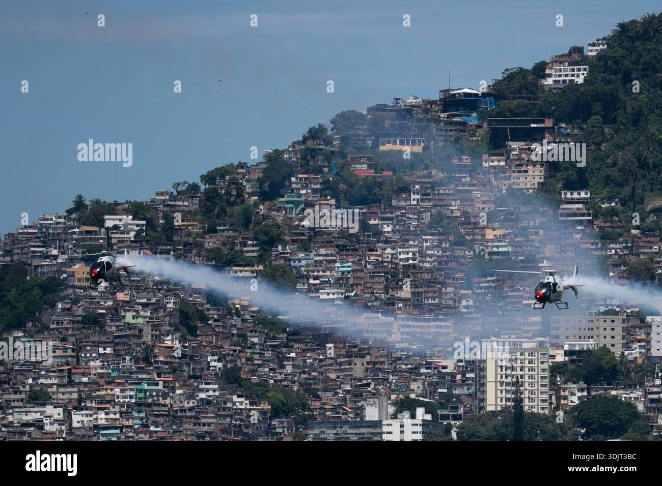 Helicopters from Spain's Air Force "Patrulla Aspa" perform over Ipanema ...