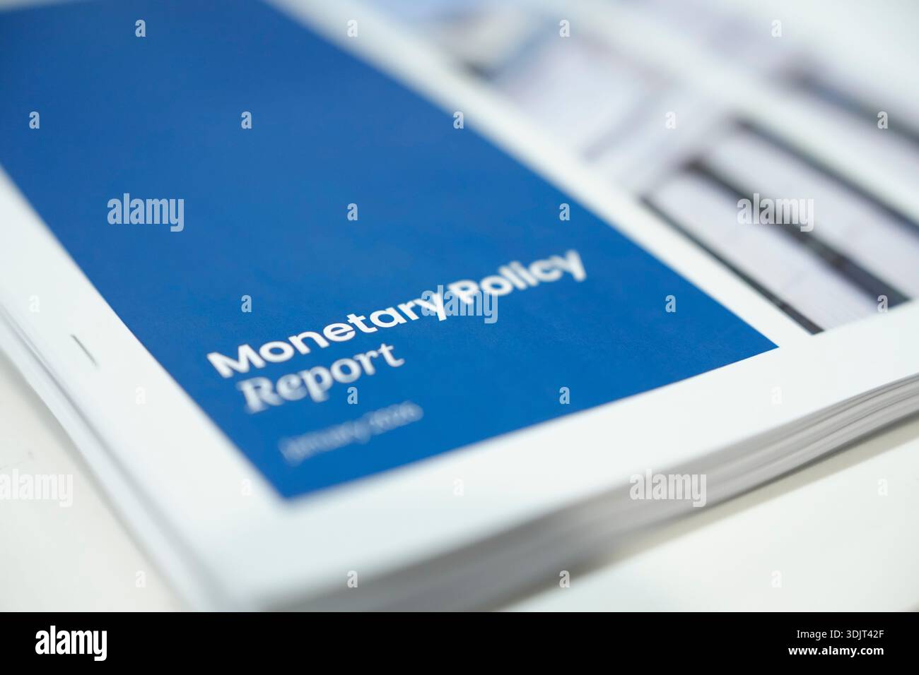 A copy of the Monetary Policy report is seen as Bank of Canada Governor ...