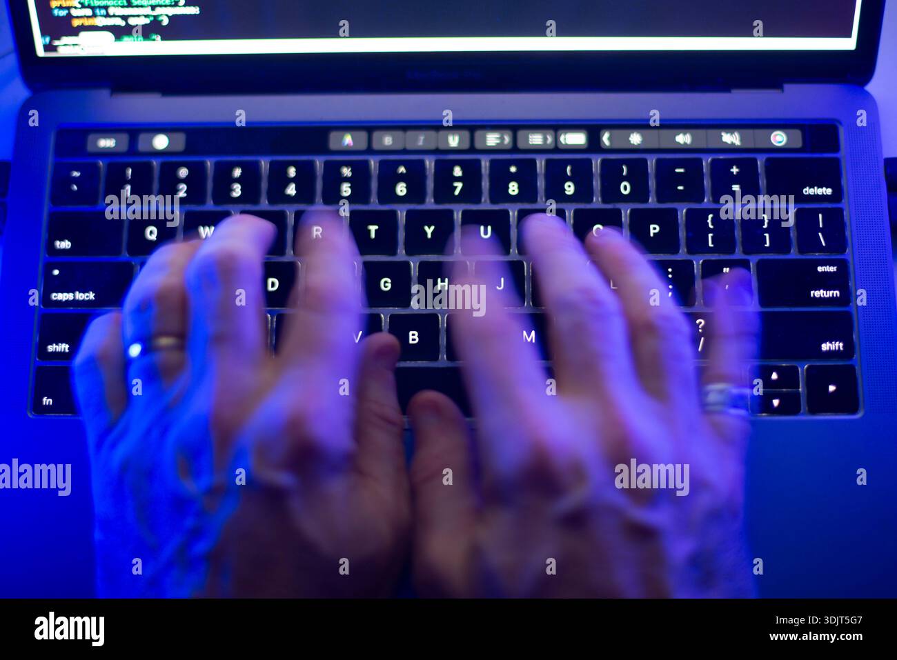 A man uses a computer keyboard in Toronto on Monday, Oct. 9, 2023, in ...