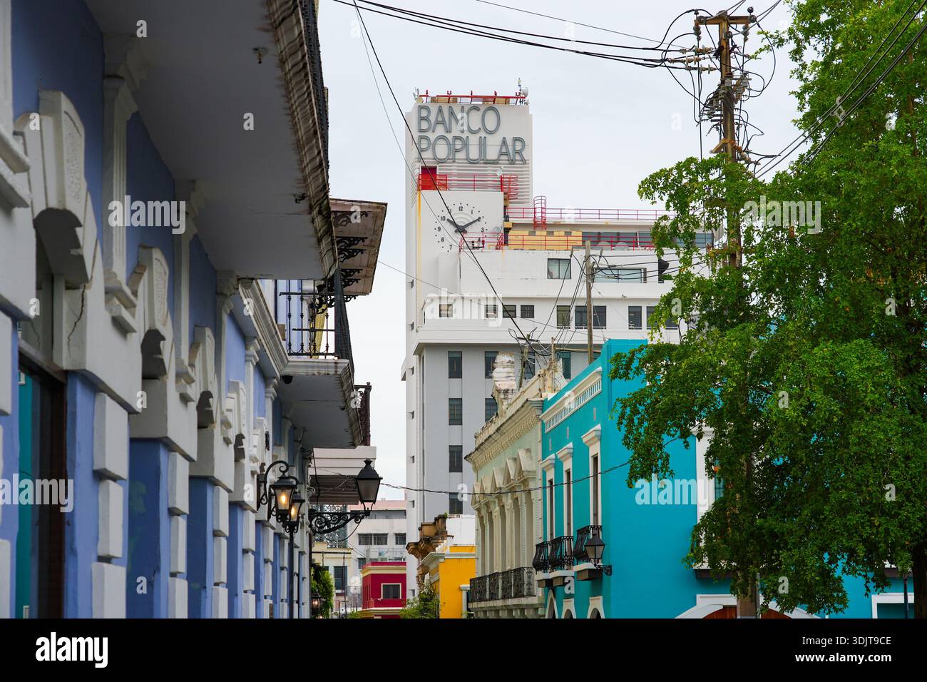 The iconic Banco Popular building framed by colonial architecture in ...