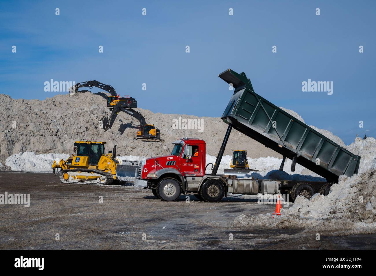 Machines move snow at one of Toronto‚Äôs snow dump sites in North York ...