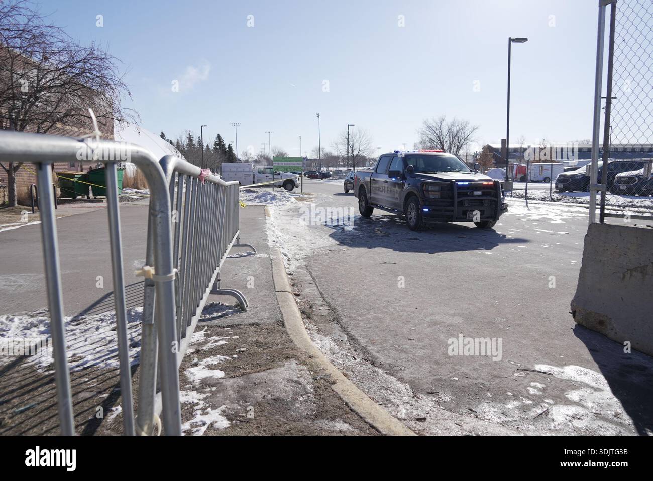 Law enforcement guards entrance to Bishop Whipple Federal building in ...