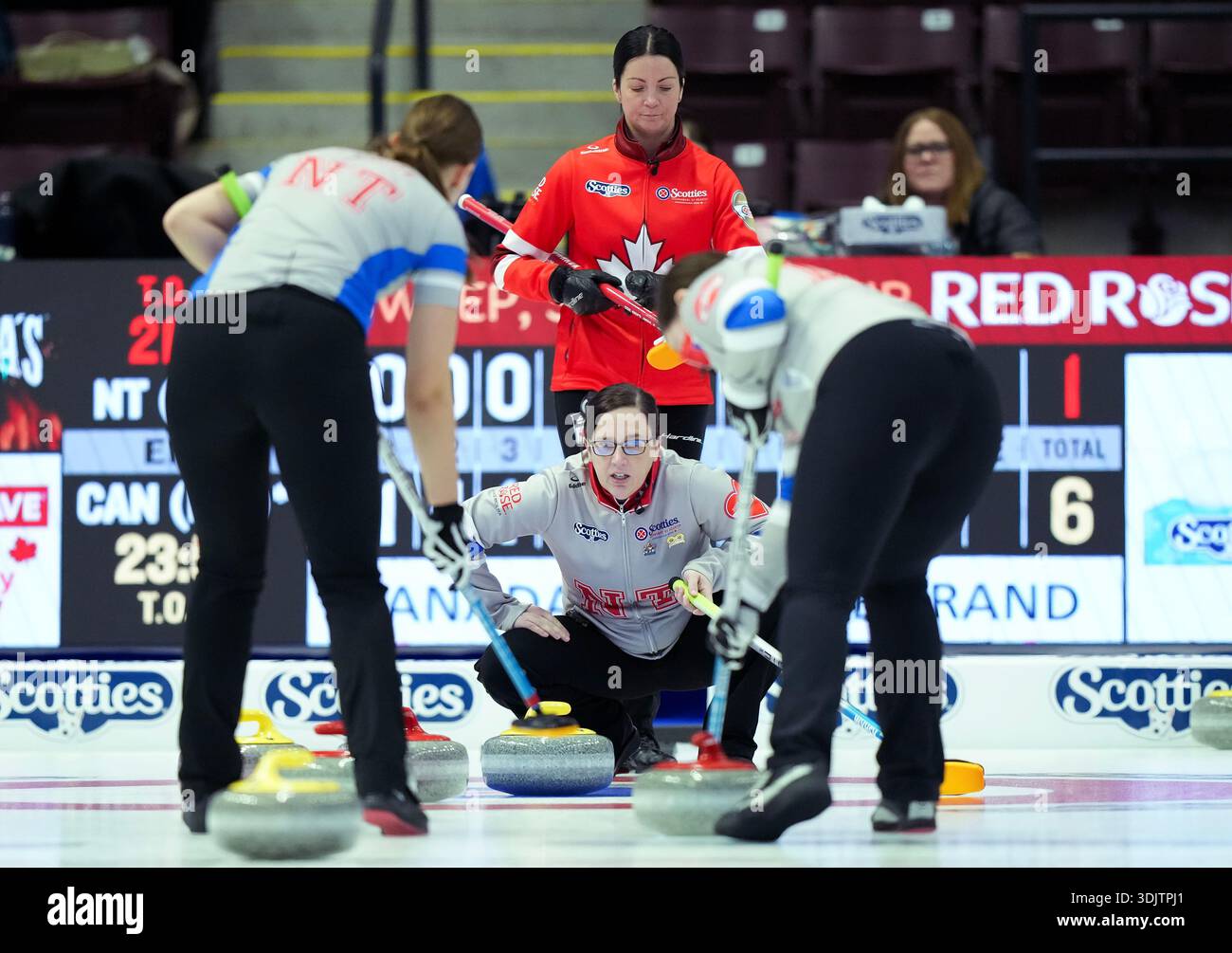 Team Northwest Territories skip Nicky Kaufman, centre, yells while ...