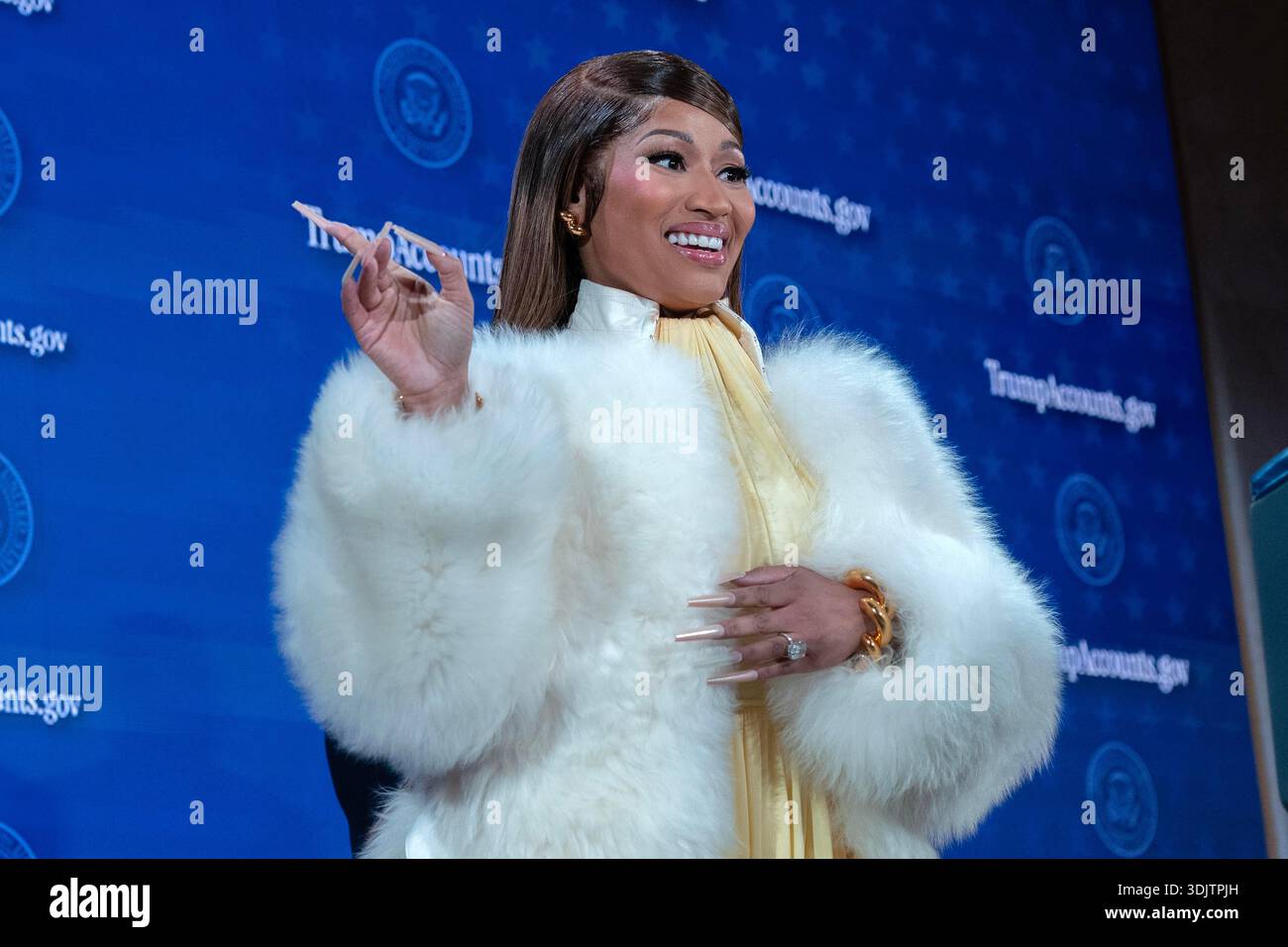 Nicki Minaj speaks to the crowd during an event for "Trump Accounts" at ...