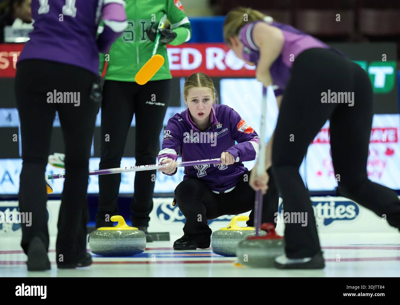 Team Yukon skip Bayly Scoffin, centre, yells as they compete against ...