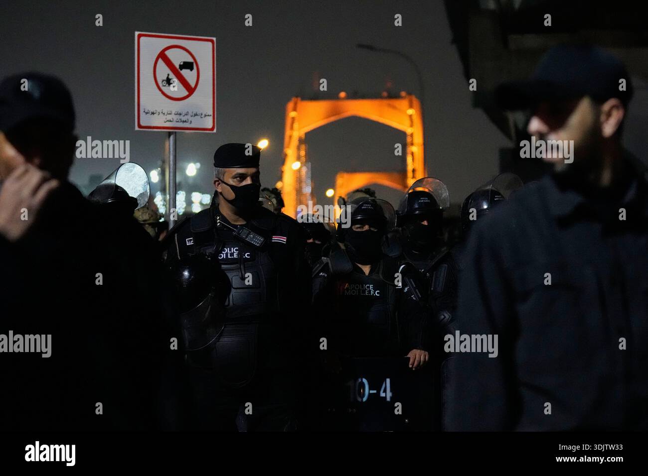 Iraqi security forces close a bridge leading to the Green Zone where ...