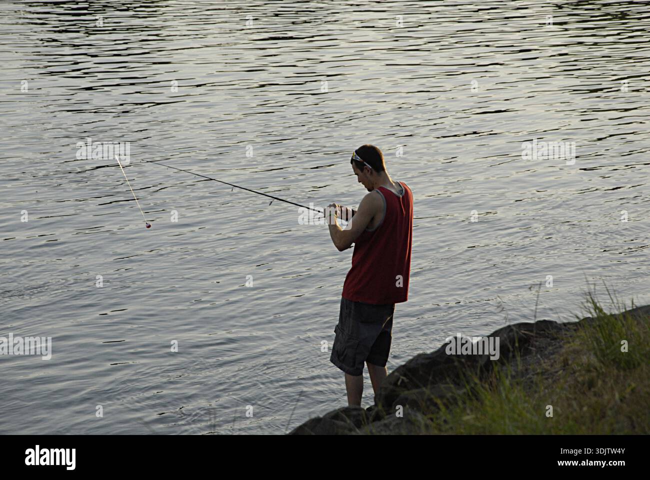 LEWISTON/IDAHO /USA- Life ANDF FISHING AT at Snake river sunset speed ...