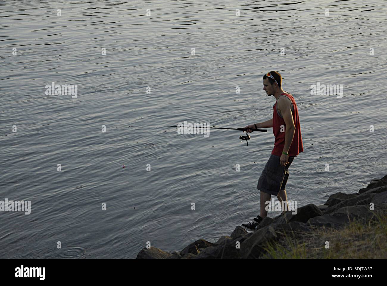 LEWISTON/IDAHO /USA- Life ANDF FISHING AT at Snake river sunset speed ...