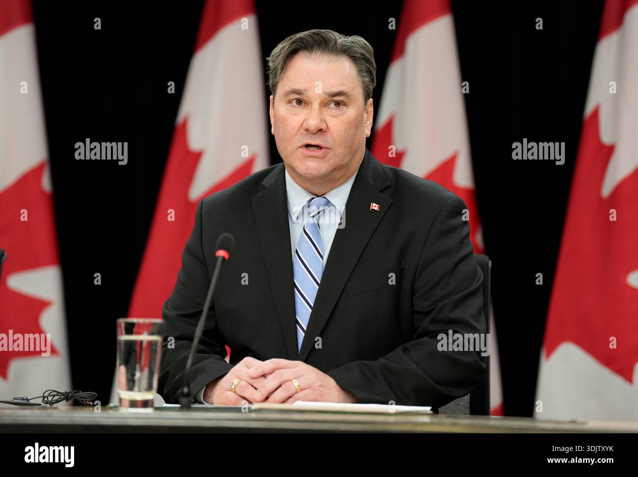 NDP leader Don Davies speaks with media in Ottawa on Wednesday, Jan. 28 ...