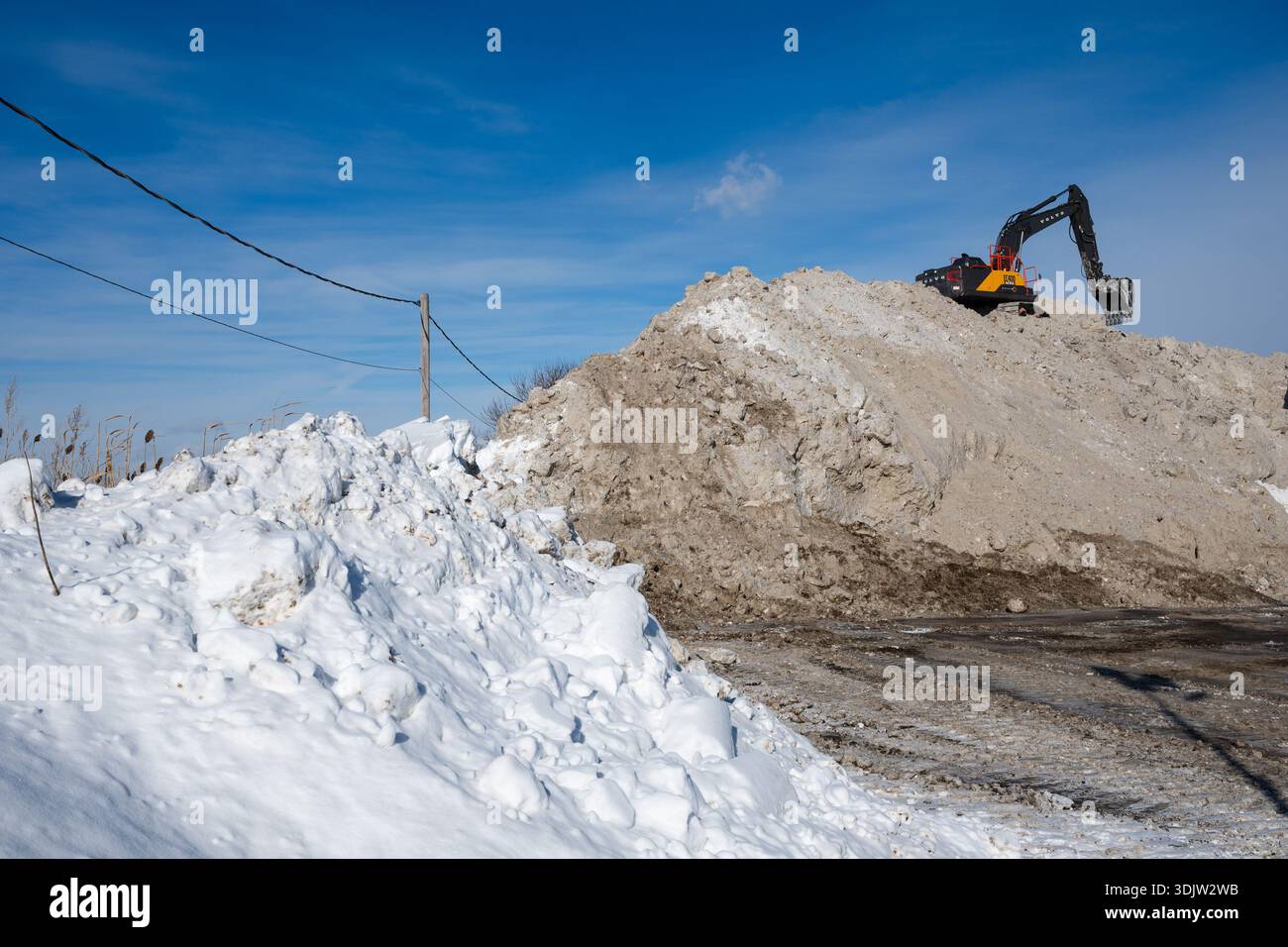 Machines move snow at one of Toronto‚Äôs snow dump sites in North York ...