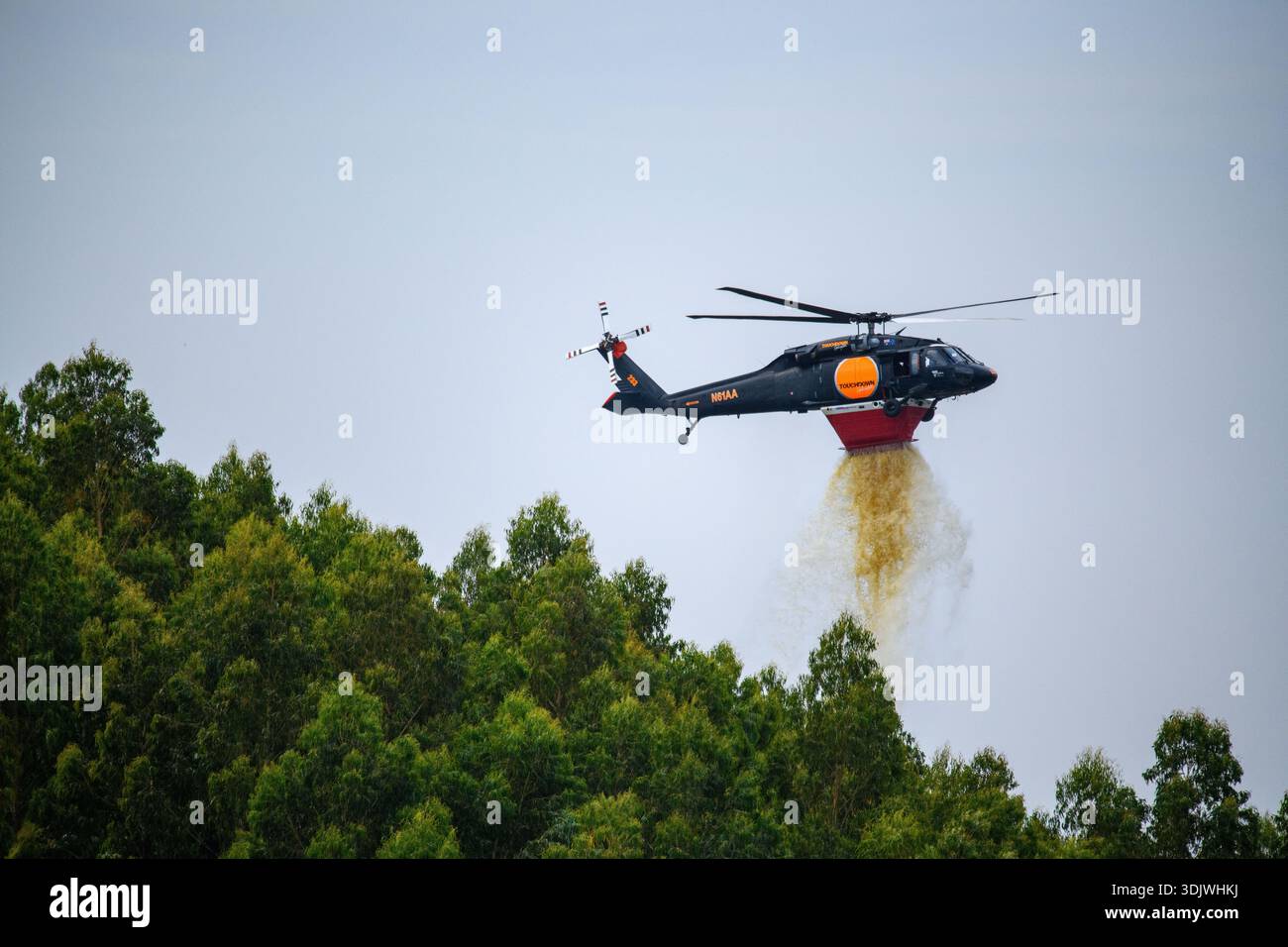 A fire fighting aircraft near Gellibrand drops a load of water on a ...