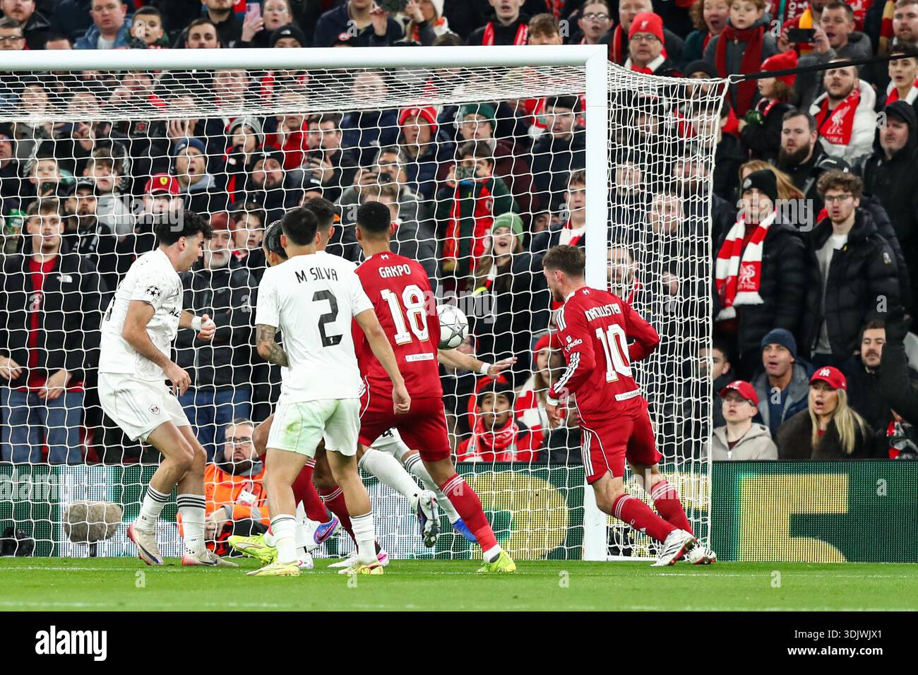 Alexis Mac Allister of Liverpool shoots and scores to make it 1-0 ...