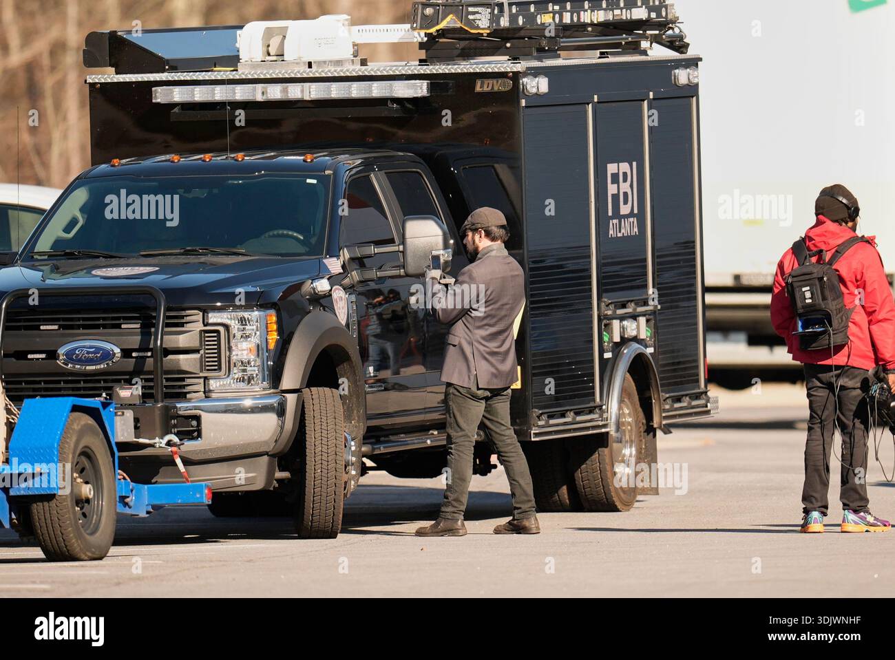FBI officers are seen at the Fulton County Election Hub and Operation ...