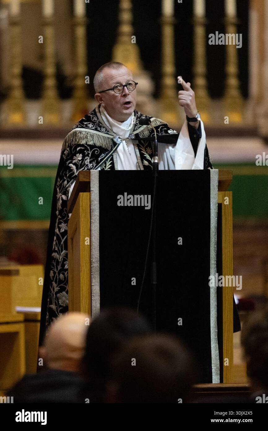 Priest Laurent Chauvin during a memorial mass for late French actress ...