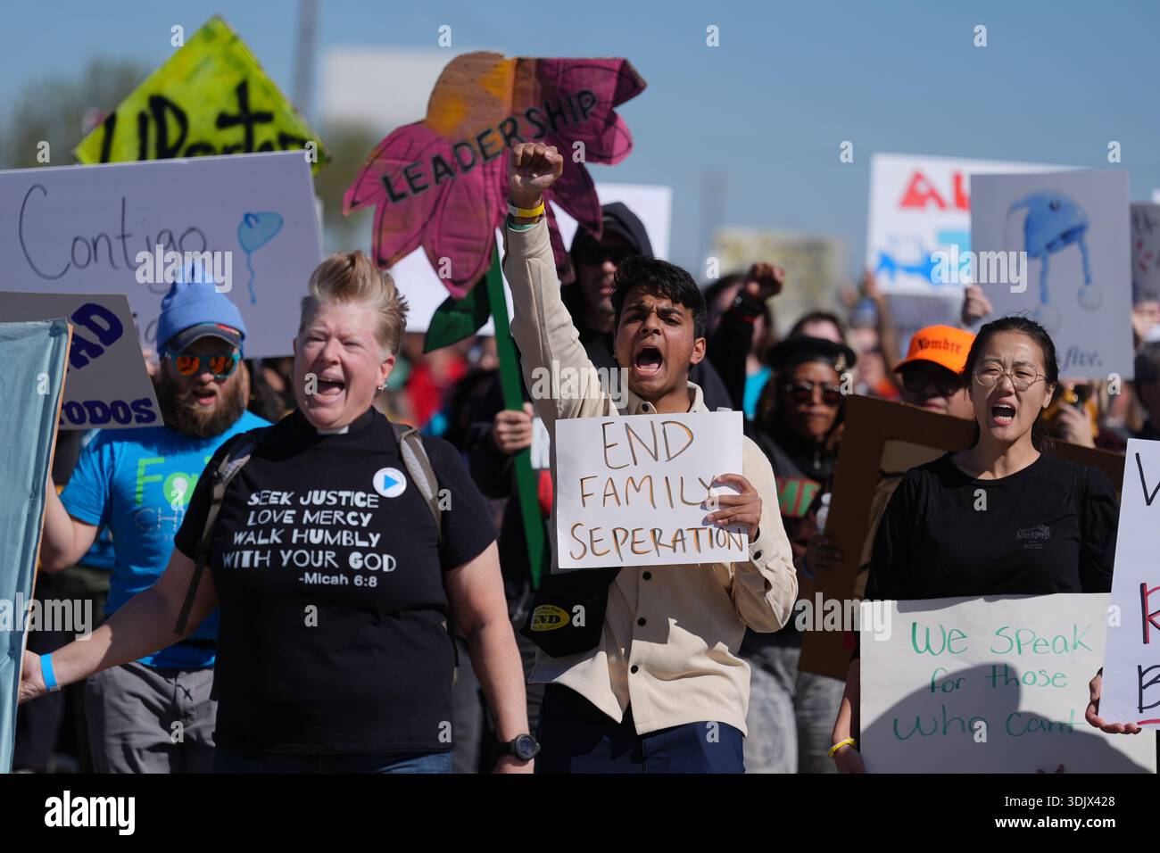 Protesters march along a highway to the South Texas Family Residential ...