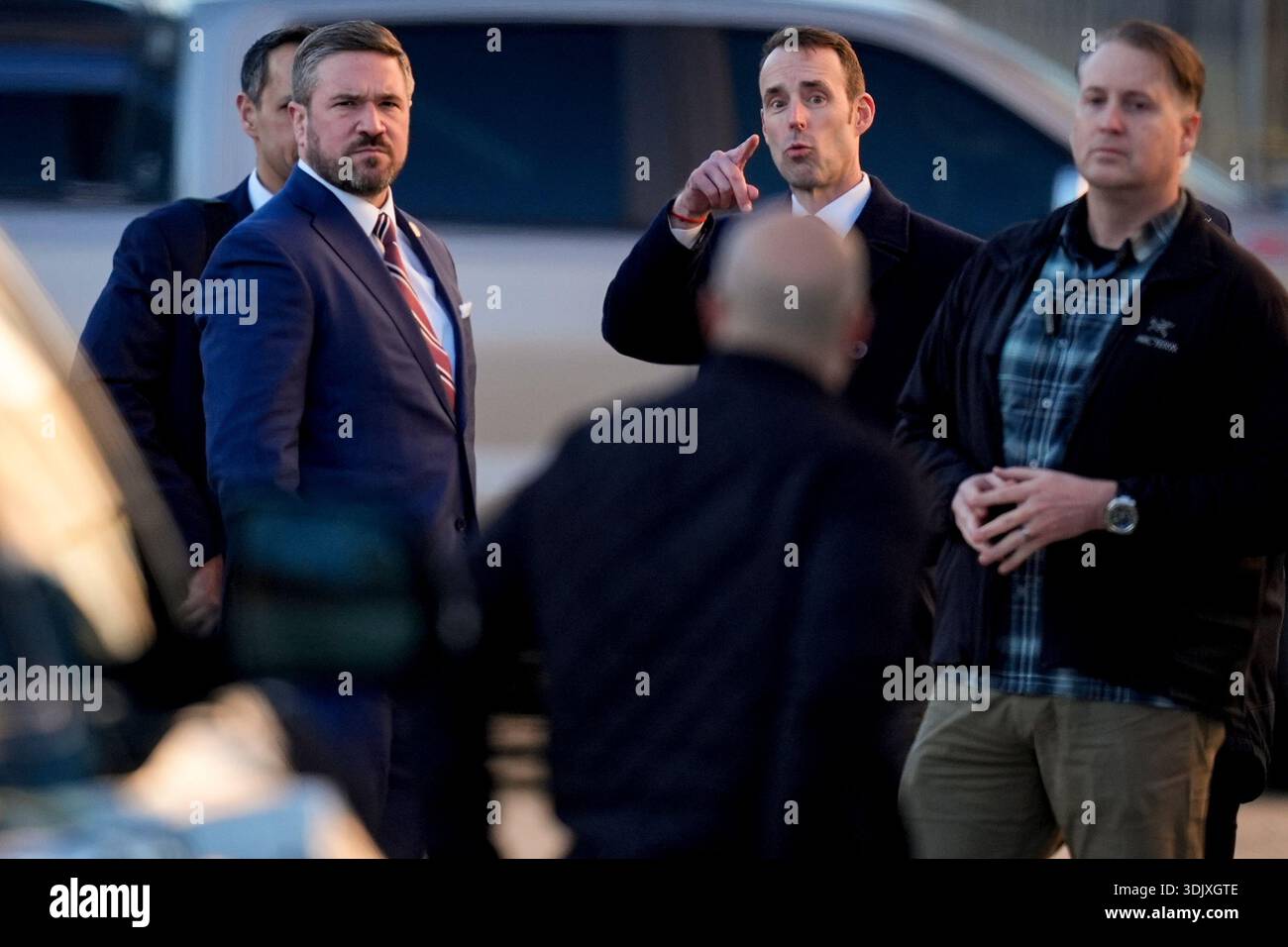 FBI Deputy Director Andrew Bailey, right, stands with members of the ...