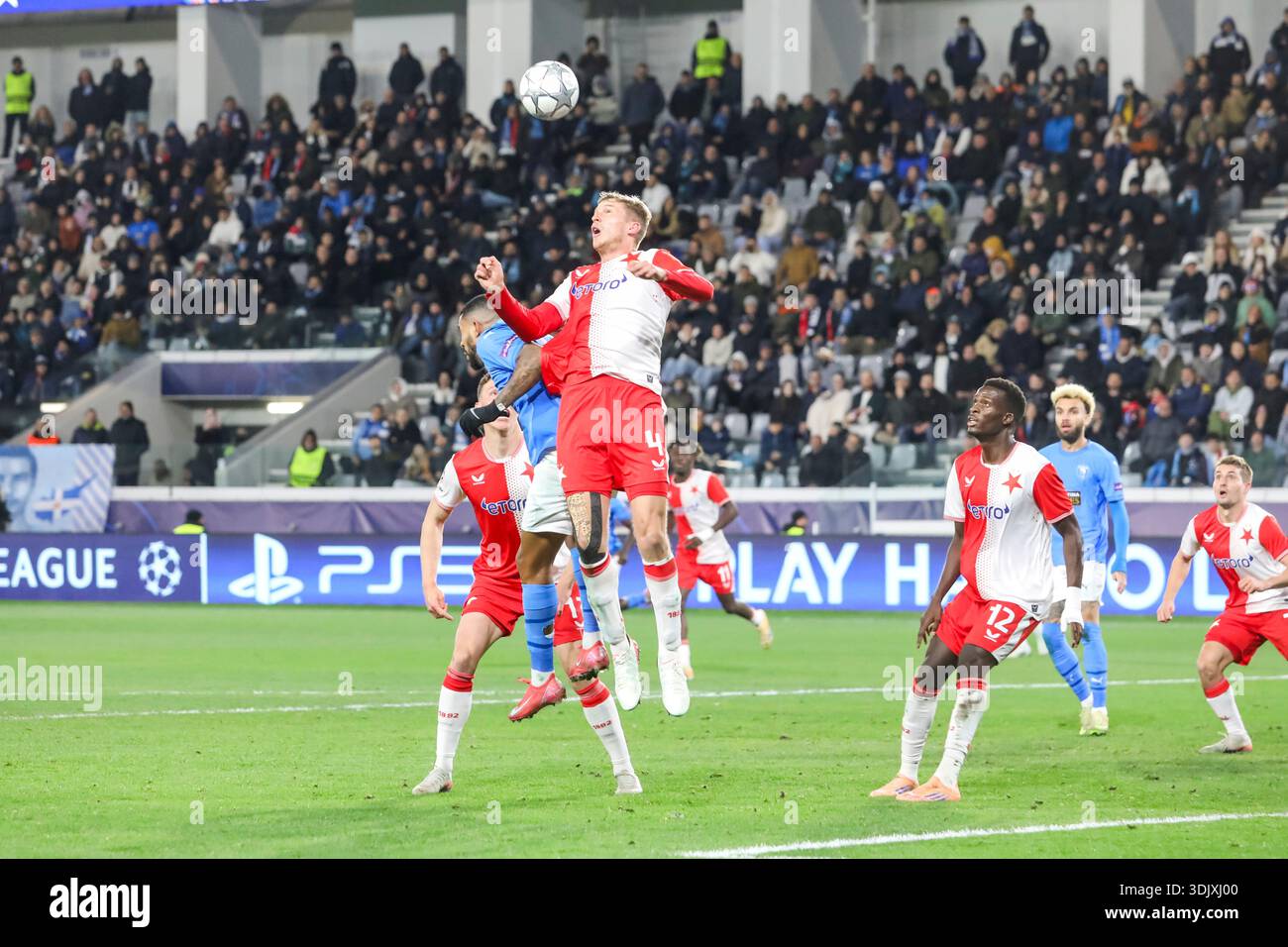 DAVID ZIMA of Slavia Praha heads the ball. Pafos plays against Slavia ...