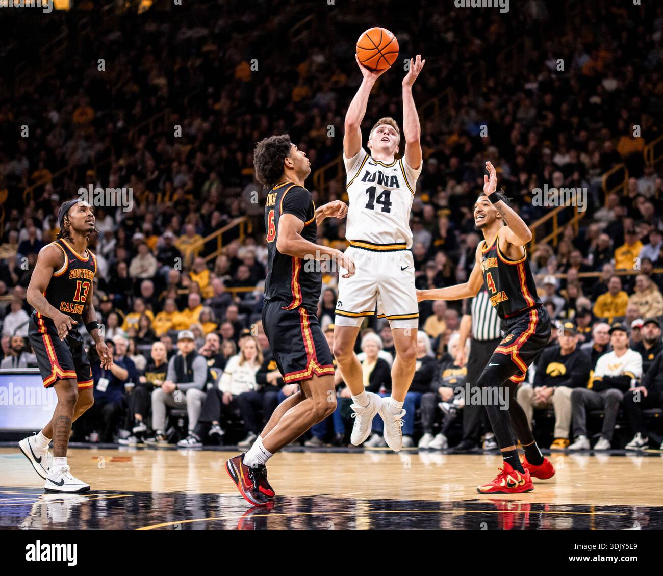 Iowa guard Bennett Stirtz (14) shoots against USC during an NCAA ...