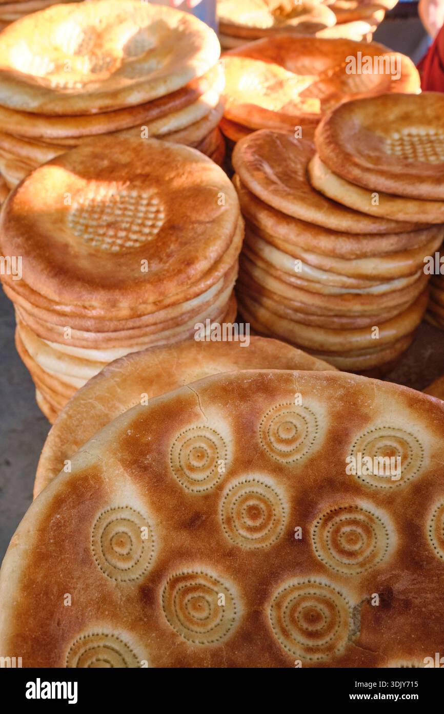 On display, many varieties of fresh baked loaves. Non, nan bread for ...