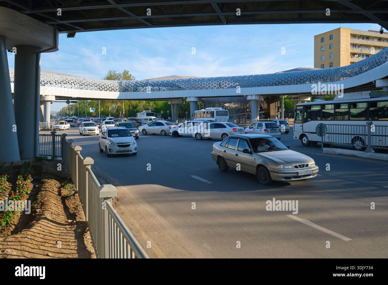 The modern, raised pedestrian walkway over the vehicle intersection in ...
