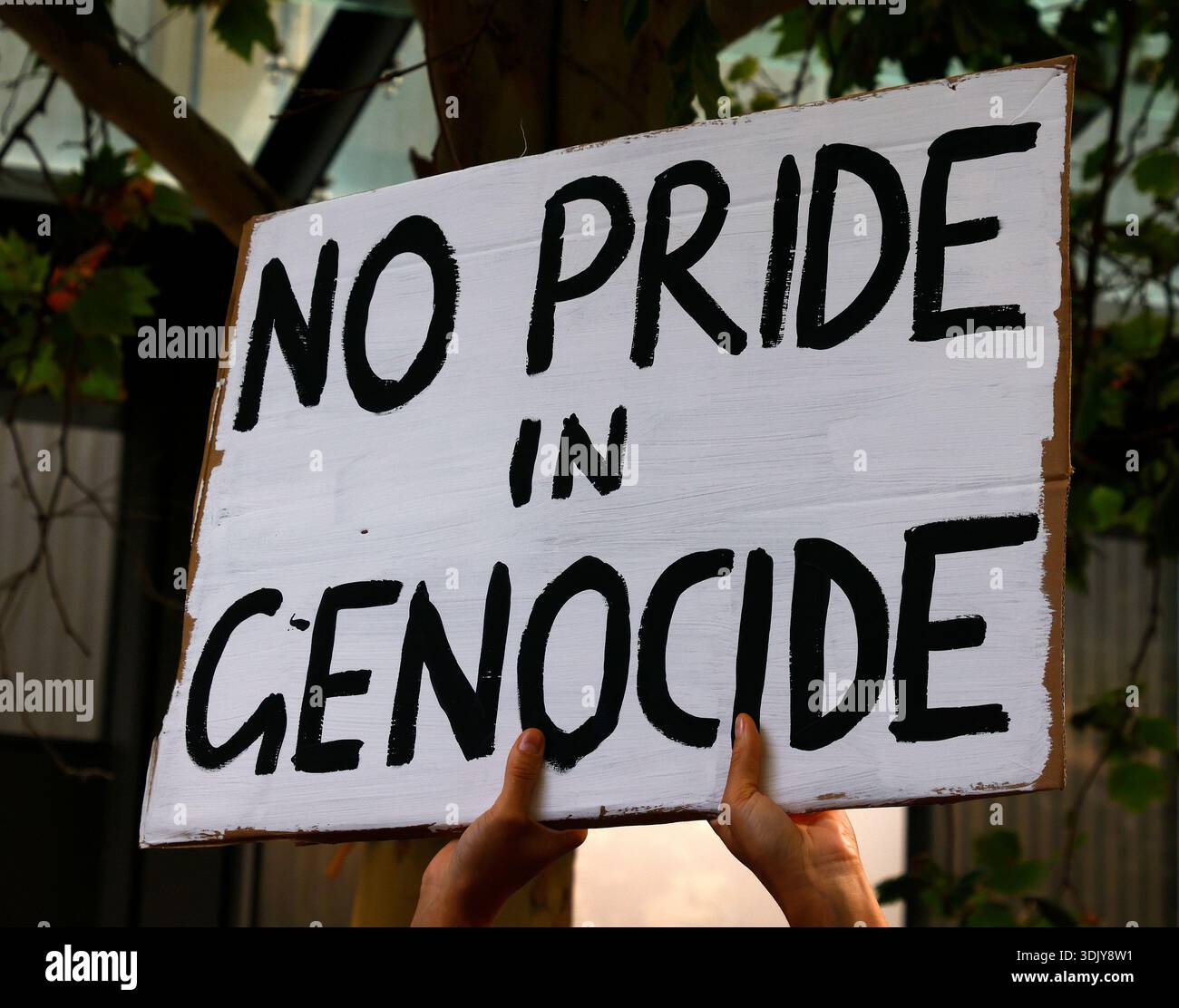 Perth, WA, Australia. January 26, 2026. Handwritten placards protest ...