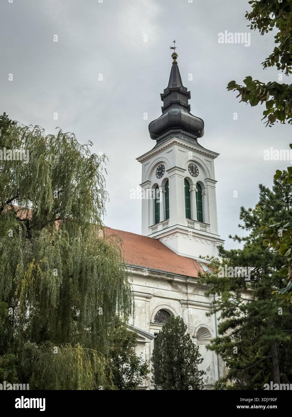 Serbian Orthodox church with a baroque tower, clock and onion dome ...