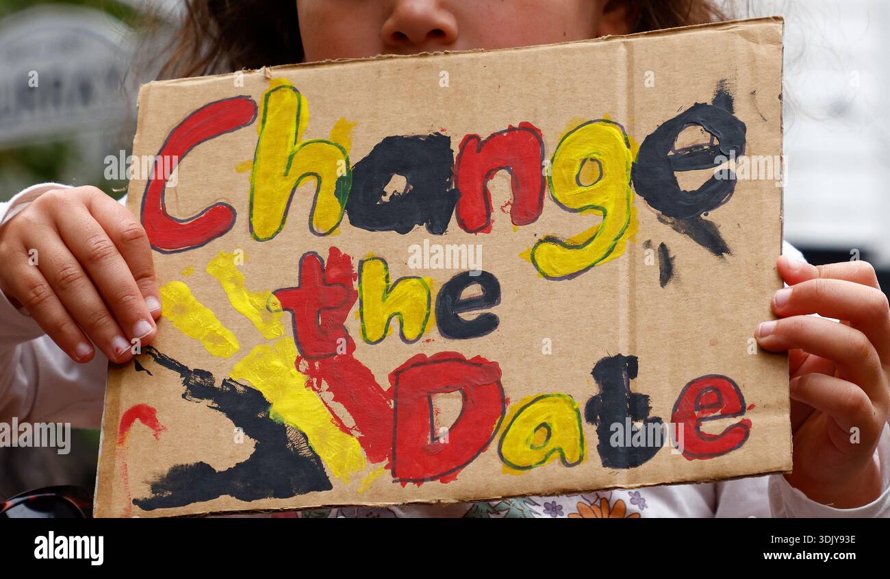 Perth, WA, Australia. January 26, 2026. Handwritten placards protest ...