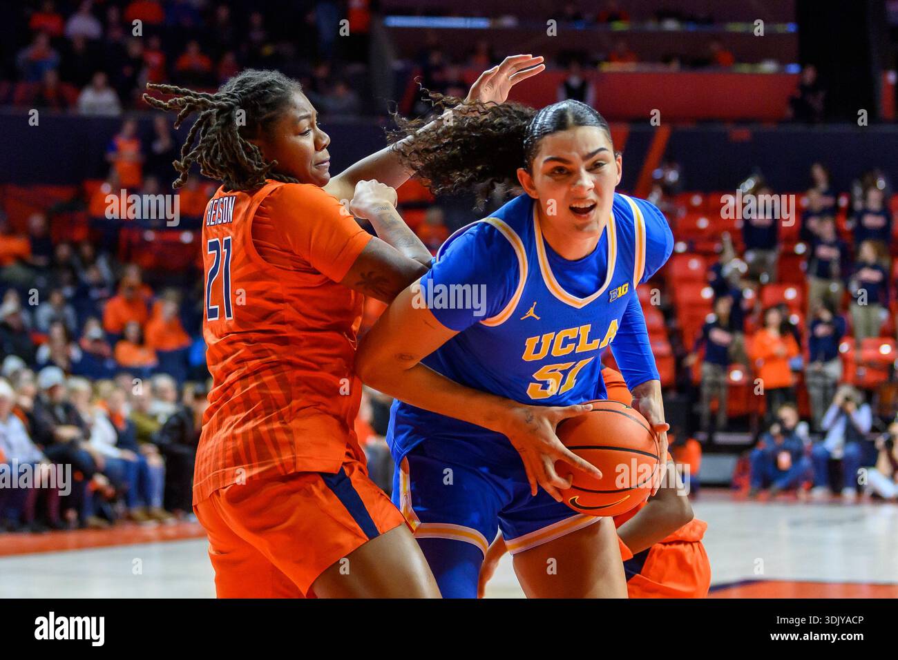 UCLA's Lauren Betts fights for position against Illinois' Naomi Benson ...