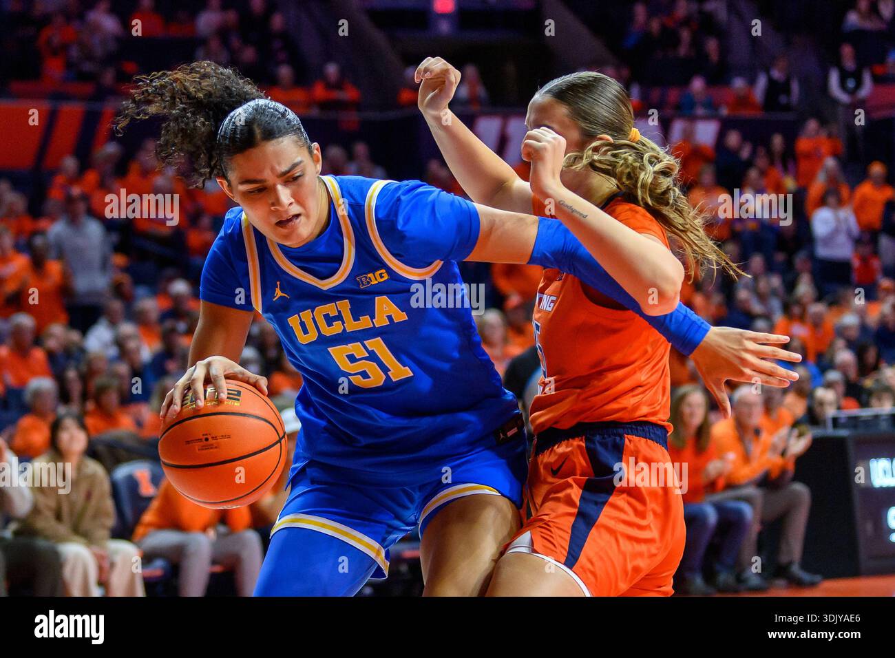 UCLA's Lauren Betts fights for position against Illinois' Hayven Smith ...