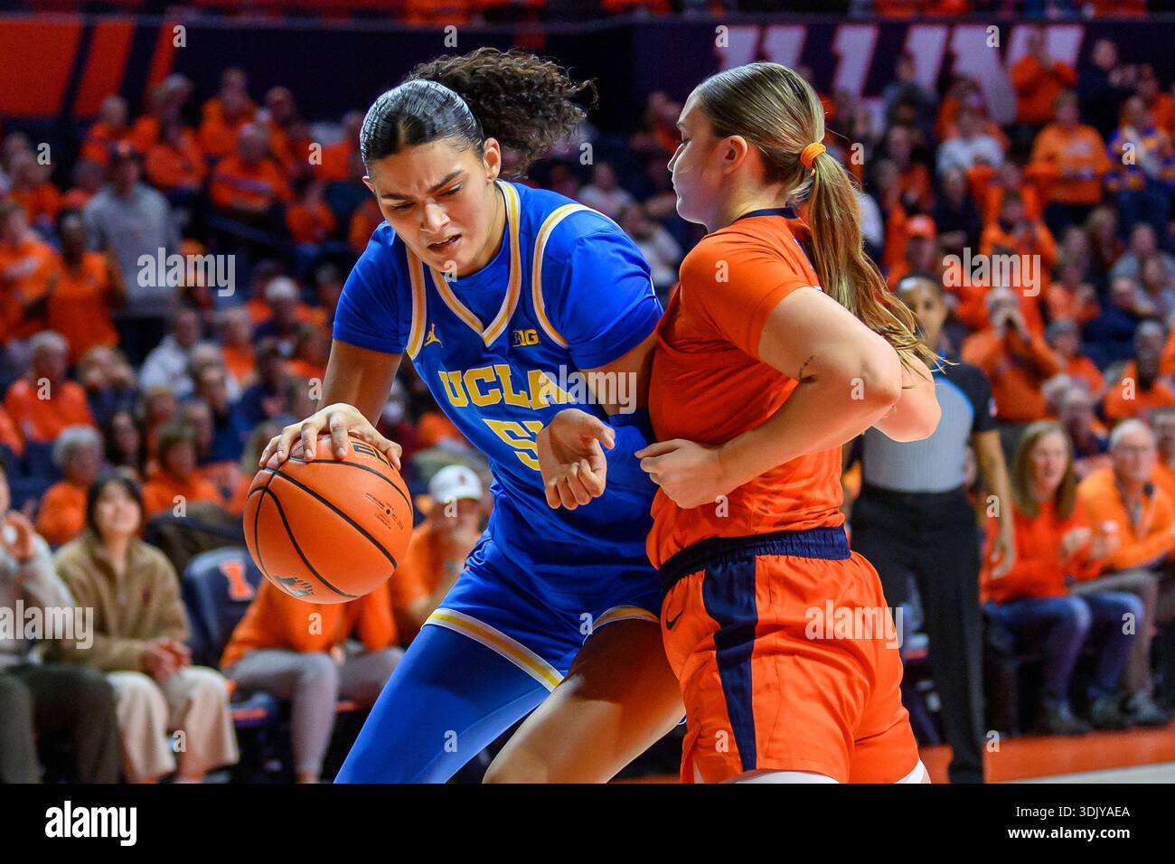 UCLA's Lauren Betts fights for position against Illinois' Hayven Smith ...