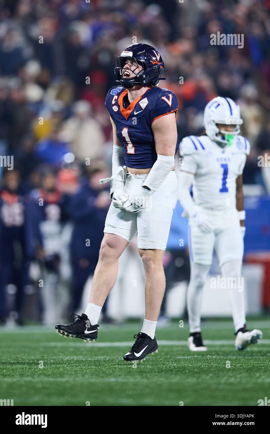 Virginia linebacker James Jackson (1) reacts after making a play ...