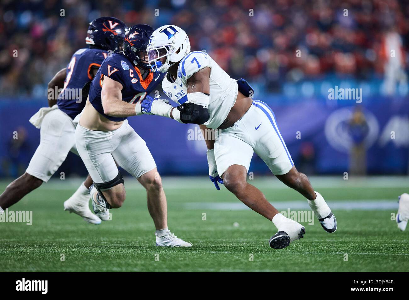 Duke defensive end Vincent Anthony Jr. (7) works to get around Virginia ...