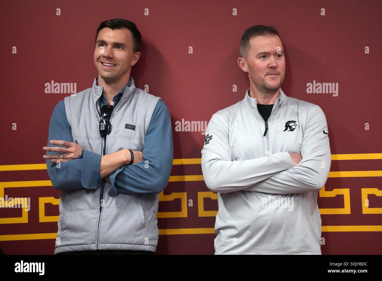 Southern California Trojans general manager Chad Bowden (left) and ...