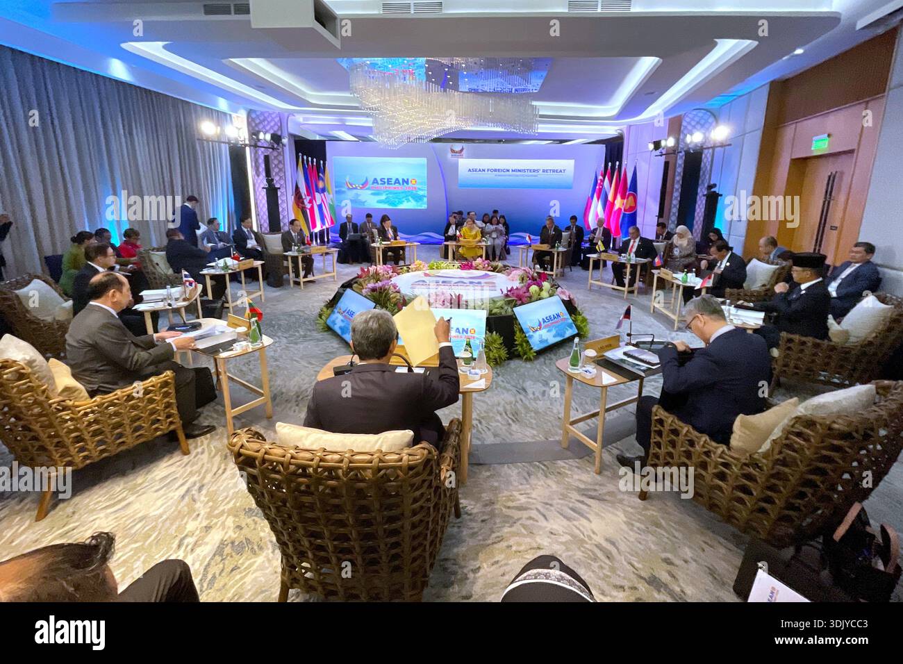 Philippine Foreign Secretary Theresa Lazaro, rear center, delivers her ...